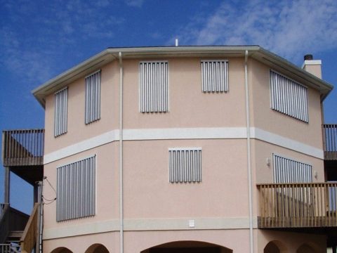 Choosing the Perfect Storm Panel for Your 30A Home - Gulf Coast Shutter